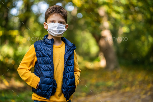 Boy with face mask Stock Photo by djoronimo | PhotoDune