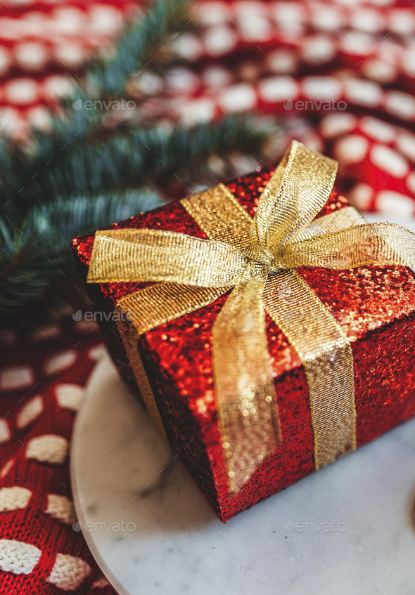 Christmas themed gift box with pine branches Stock Photo by Rawpixel