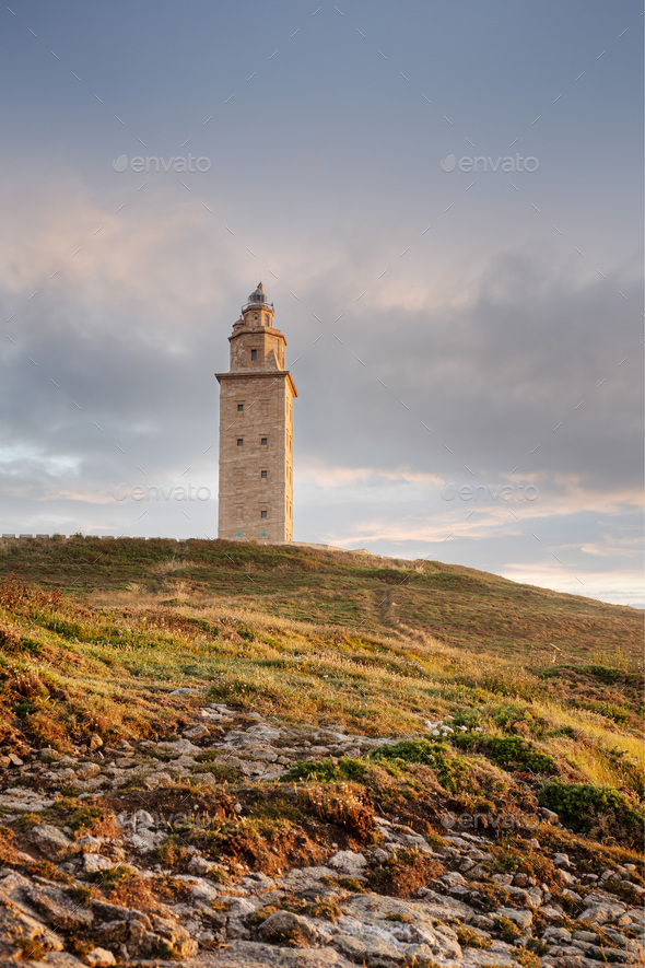 View of Tower of Hercules ancient roman lighthouse at sunset. Stock ...
