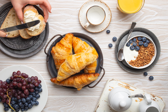 Traditional morning breakfast food on rustic white wooden background ...