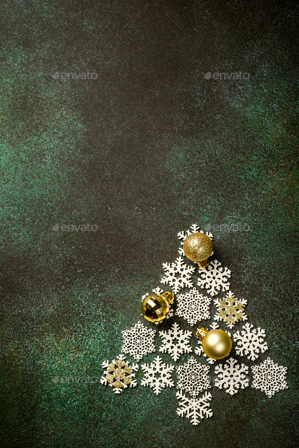 Festive background with wooden christmas tree Stock Photo by Merinka