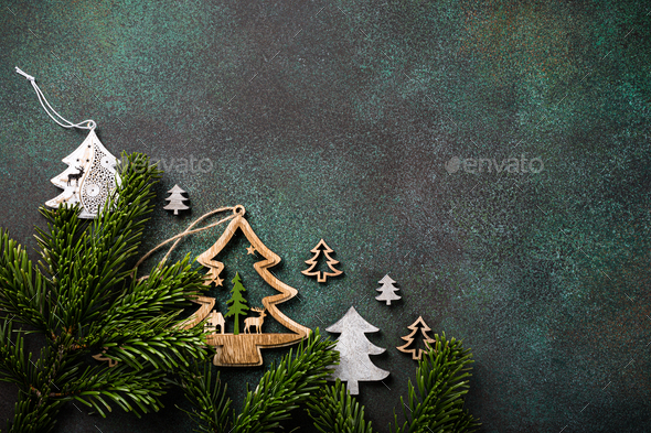 Festive background with wooden christmas tree Stock Photo by Merinka