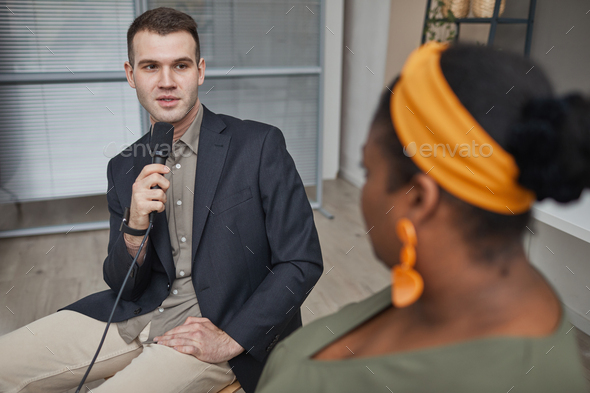 TV reporter taking an interview Stock Photo by AnnaStills | PhotoDune