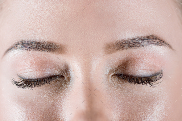 Close-up view of closed female eyes with long eyelashes Stock Photo by ...