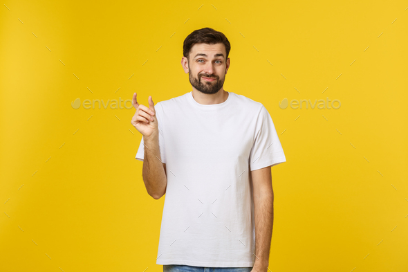 Caucasian man show small size by fingers demonstrate tiny measure, tell ...
