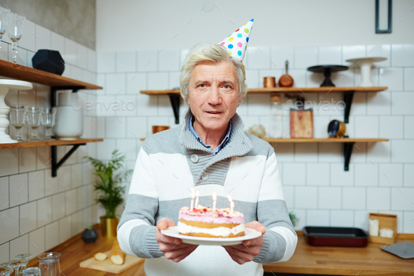 Man with cake Stock Photo by Pressmaster | PhotoDune