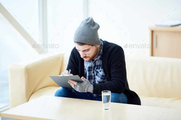 Filling in papers Stock Photo by Pressmaster | PhotoDune