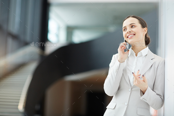 Calling clients Stock Photo by Pressmaster | PhotoDune