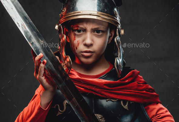 Angry roman little soldier with sword in dark background Stock Photo by ...