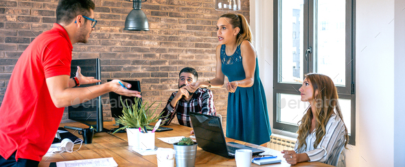 Coworkers arguing in the office Stock Photo by davidpereiras | PhotoDune