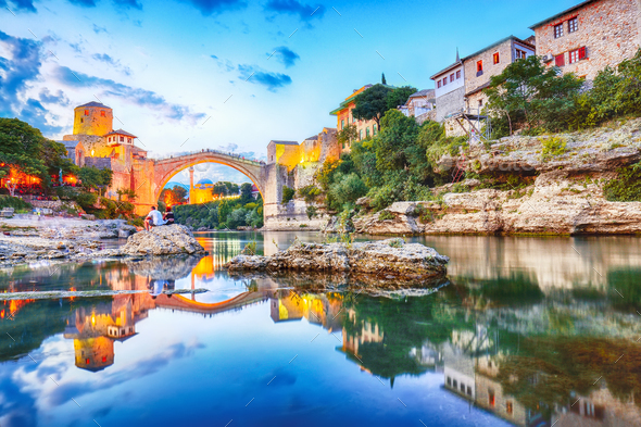 Majestic evening view of Mostar with the Mostar Bridge, houses and ...