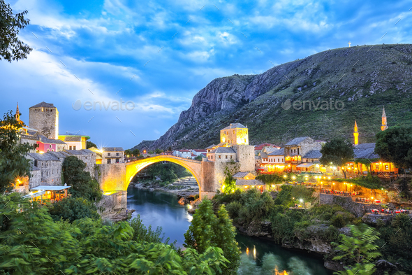 Majestic evening view of Mostar with the Mostar Bridge, houses and ...