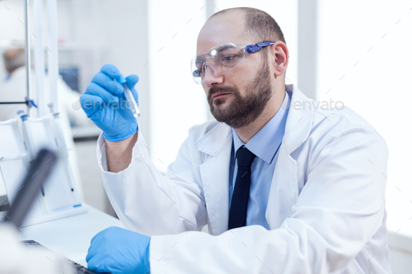 Genetic scientist conducting pharmacology exepriment Stock Photo by DC ...