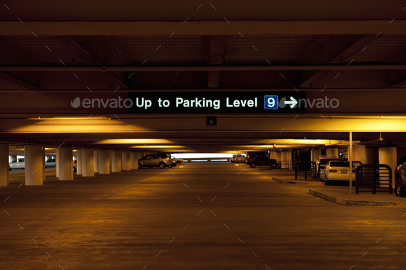Exit sign in parking lot. Stock Photo by Mint_Images | PhotoDune