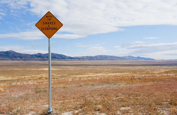 Warning sign of snakes and scorpions in grassland. Stock Photo by Mint ...