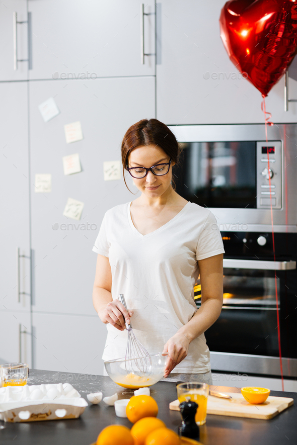 Cooking at home Stock Photo by Pressmaster | PhotoDune
