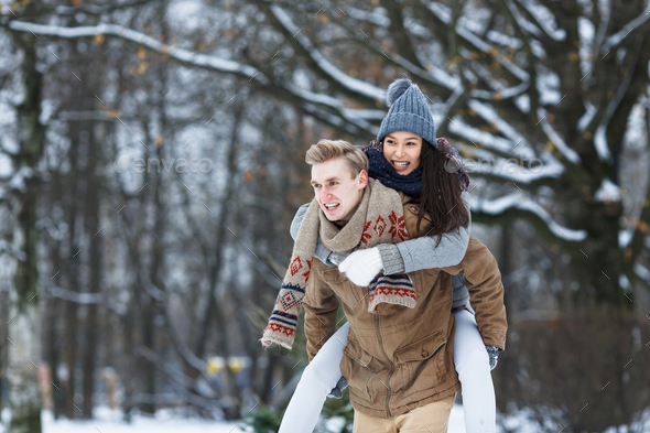 Piggyback Stock Photo by Pressmaster | PhotoDune