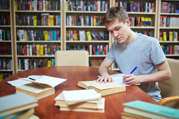 Preparing task for lesson Stock Photo by Pressmaster | PhotoDune