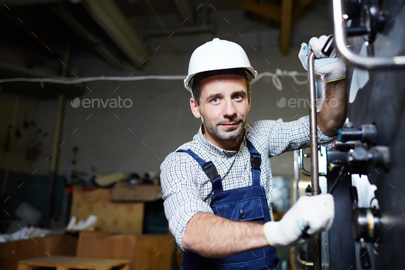 Modern factory worker Stock Photo by Pressmaster | PhotoDune