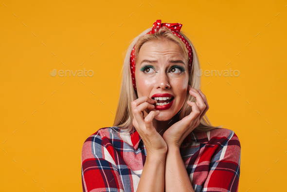 Image of scared beautiful pinup girl posing on camera Stock Photo by ...