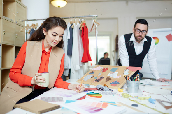 Designing clothes Stock Photo by Pressmaster | PhotoDune