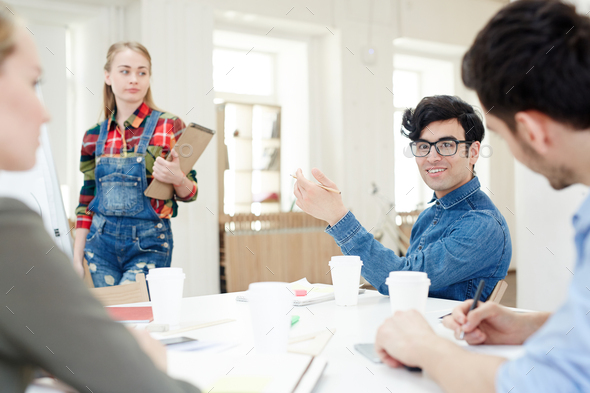 Talk of groupmates Stock Photo by Pressmaster | PhotoDune