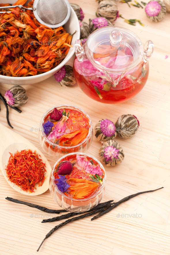 Herbal natural floral tea infusion with dry flowers Stock Photo by keko64