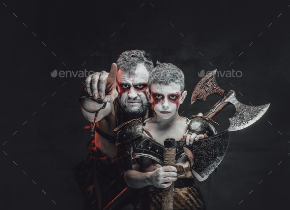 Tribal father warrior pointing a finger at camera in studio Stock Photo ...