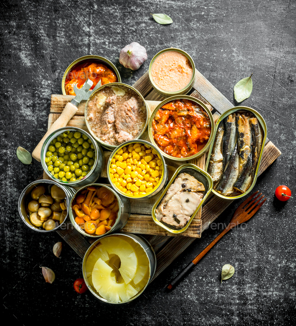 Assortment of canned food in cans. Stock Photo by Artem_ka2 | PhotoDune