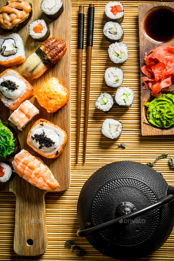 Traditional Japanese sushi, maki and rolls on a napkin. Stock Photo by ...
