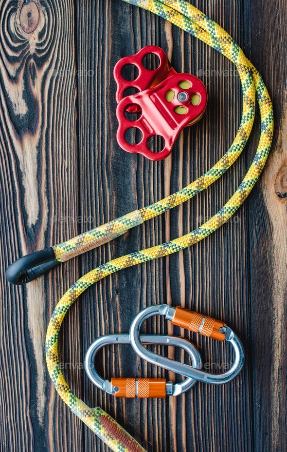 Isolated photo of climbing equipment. Parts of carabiners lying on the ...