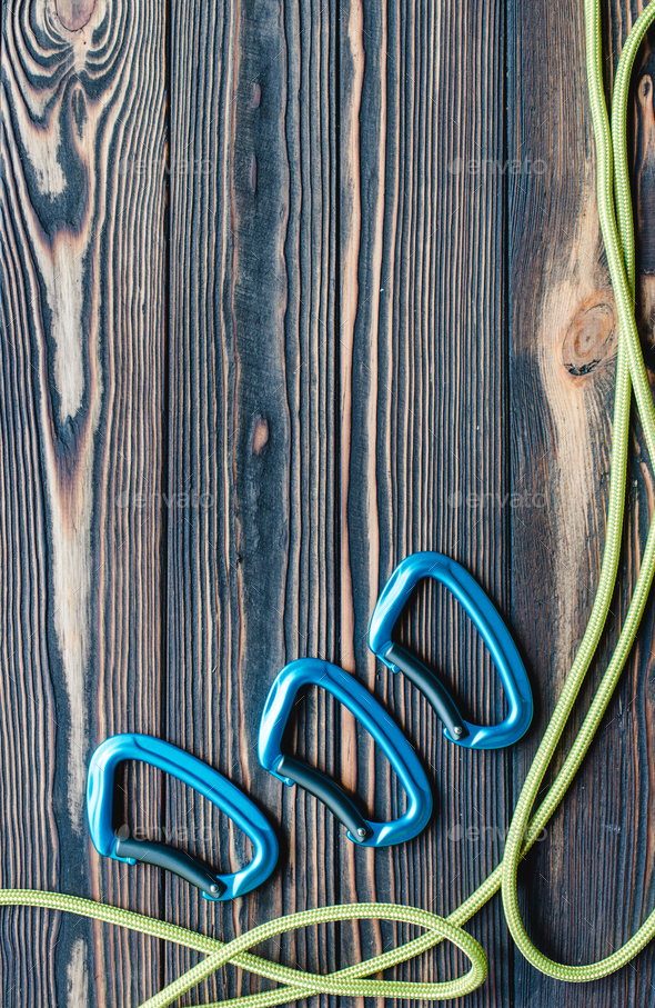 Isolated photo of climbing equipment. Parts of carabiners lying on the ...