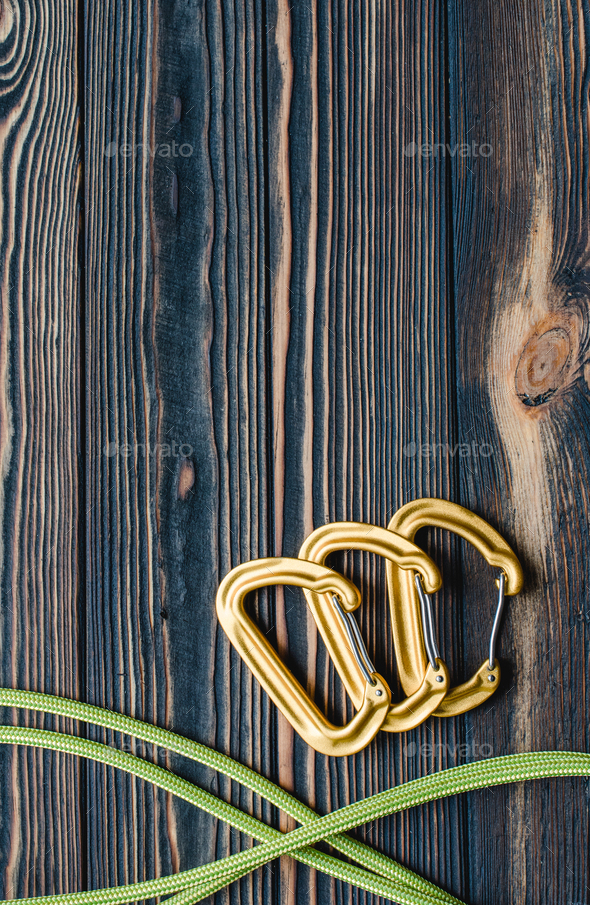 Isolated photo of climbing equipment. Parts of carabiners lying on the ...