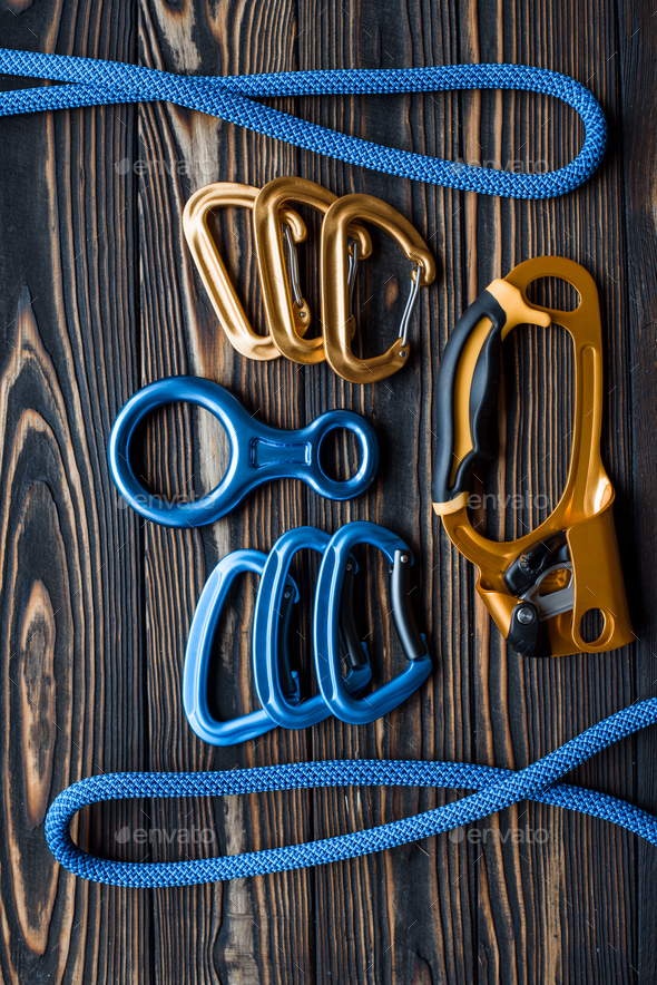 Rotated picture. Isolated photo of climbing equipment. Parts of ...
