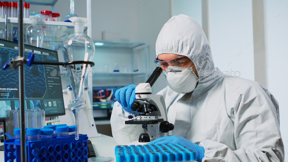 Research scientist in ppe suit conducting vaccine development Stock ...