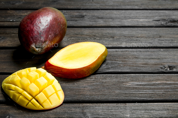 Pieces of fragrant mango. Stock Photo by Artem_ka2 | PhotoDune
