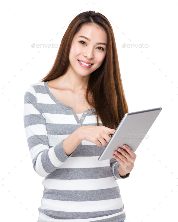 Woman use of tablet Stock Photo by leungchopan | PhotoDune