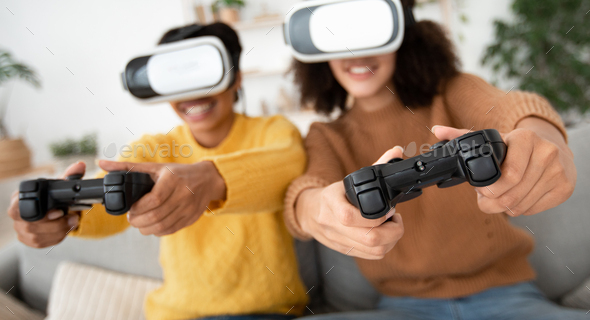 People using new modern multimedia technology and entertainment at home ...