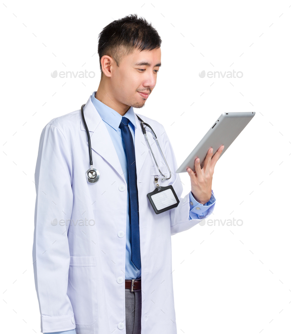 Asian doctor use of tablet Stock Photo by leungchopan | PhotoDune