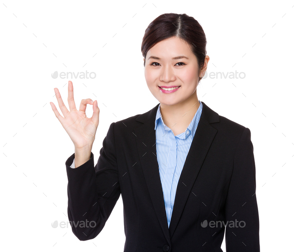 Businesswoman with ok sign Stock Photo by leungchopan | PhotoDune