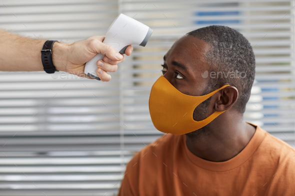 Temperature Check in Hospital Stock Photo by seventyfourimages | PhotoDune