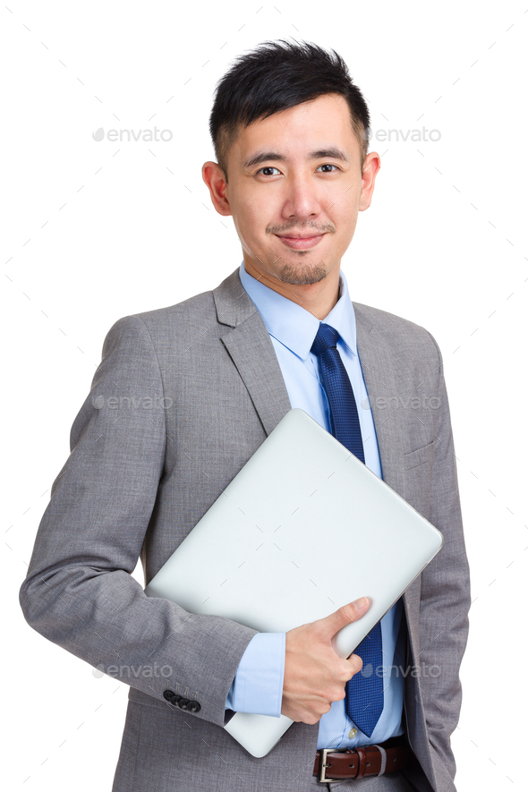Business man holding laptop computer Stock Photo by leungchopan | PhotoDune