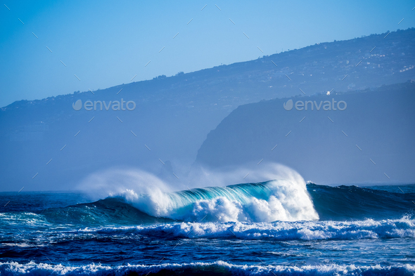 beautiful and bug wave is breaking on the sea or ocean - blue water and ...