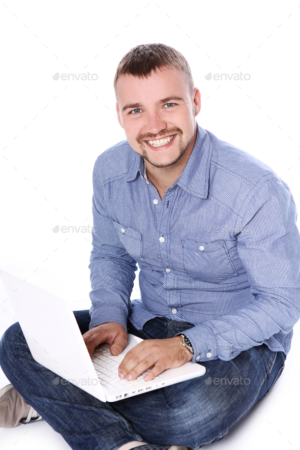 Handsome smiling guy with laptop Stock Photo by Microstock_Growth ...
