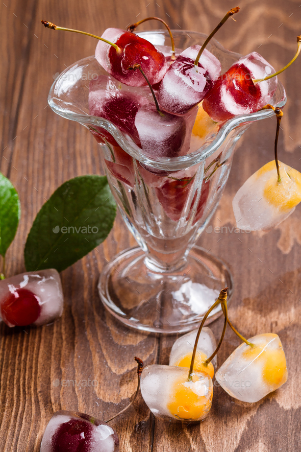 Cherry in ice cube in glass bowl Stock Photo by ipolly80 | PhotoDune