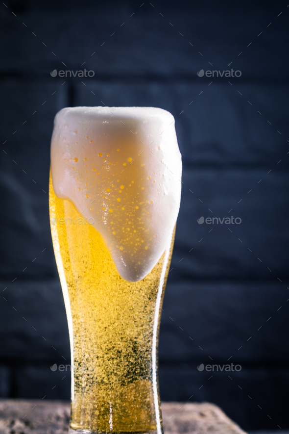 Glass of light beer Stock Photo by ipolly80 | PhotoDune
