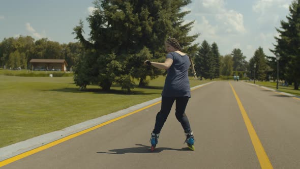 Skillful Female Rollerblading Backwards Outdoors, Stock Footage | VideoHive