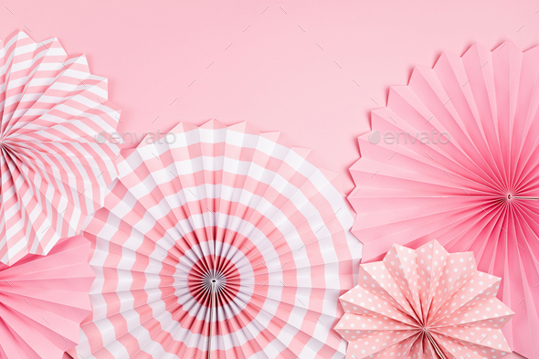 Festive party background with pink paper circle fans Stock Photo by OksaLy