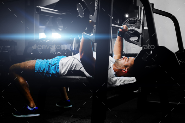 handsome fitness man weightlifting in gym with happy face Stock Photo ...
