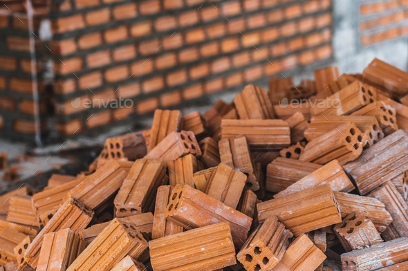 Stack of Brick preparing for mansonry over the photo blurred of Bricks ...